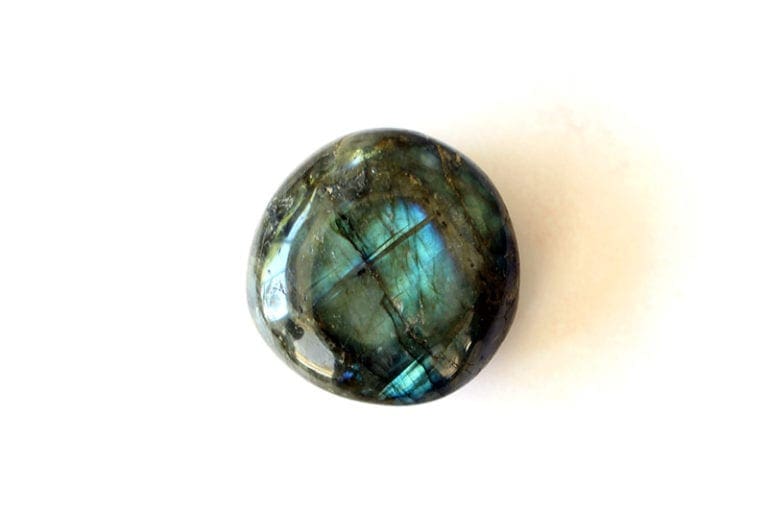Labradorite Meaning: Benefits, Types & How To Use It - The Crystal Elephant